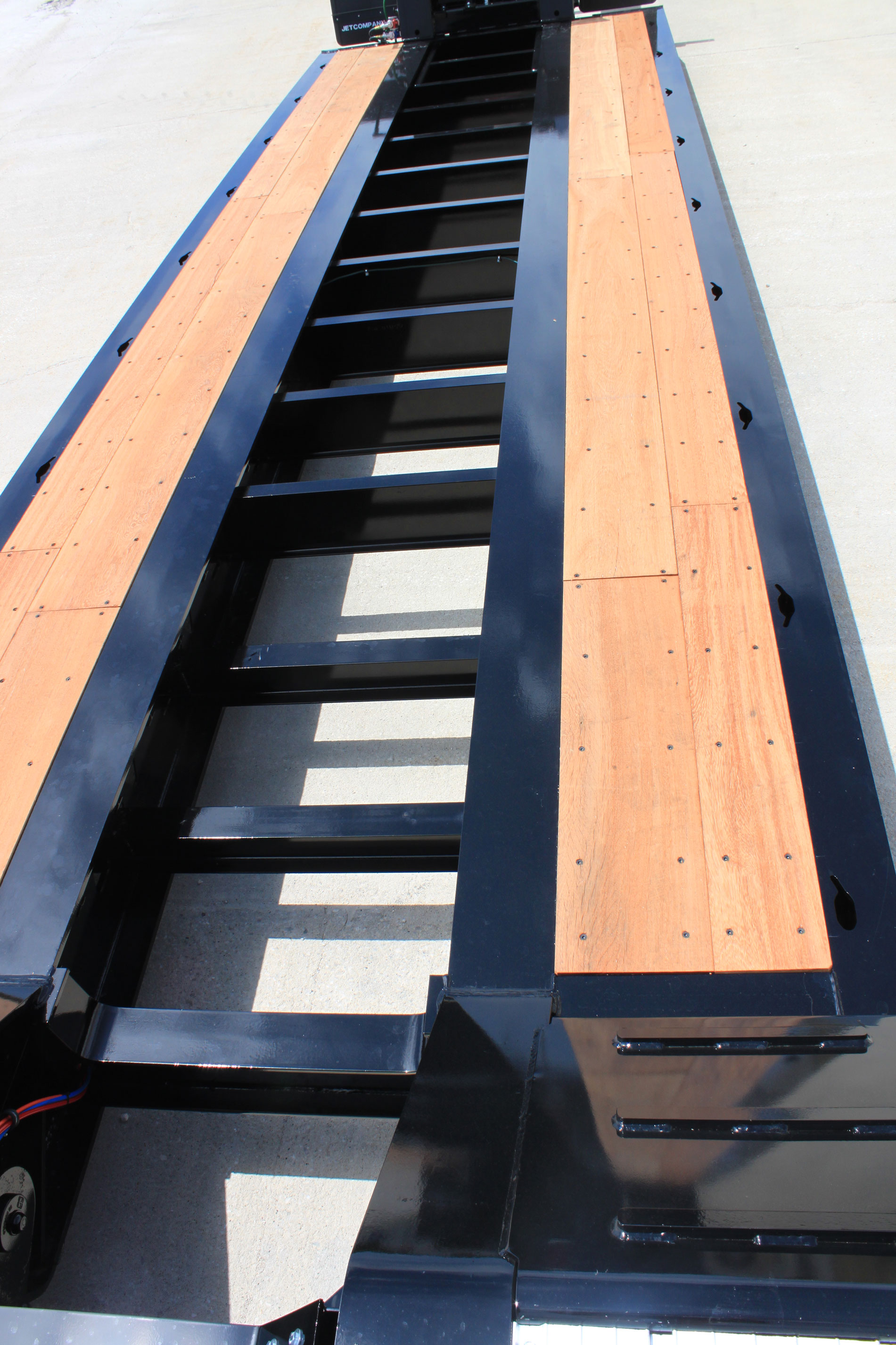 Black-Triple-Axle-Lowboy-Trailer-center-view - Jet Co Trailers