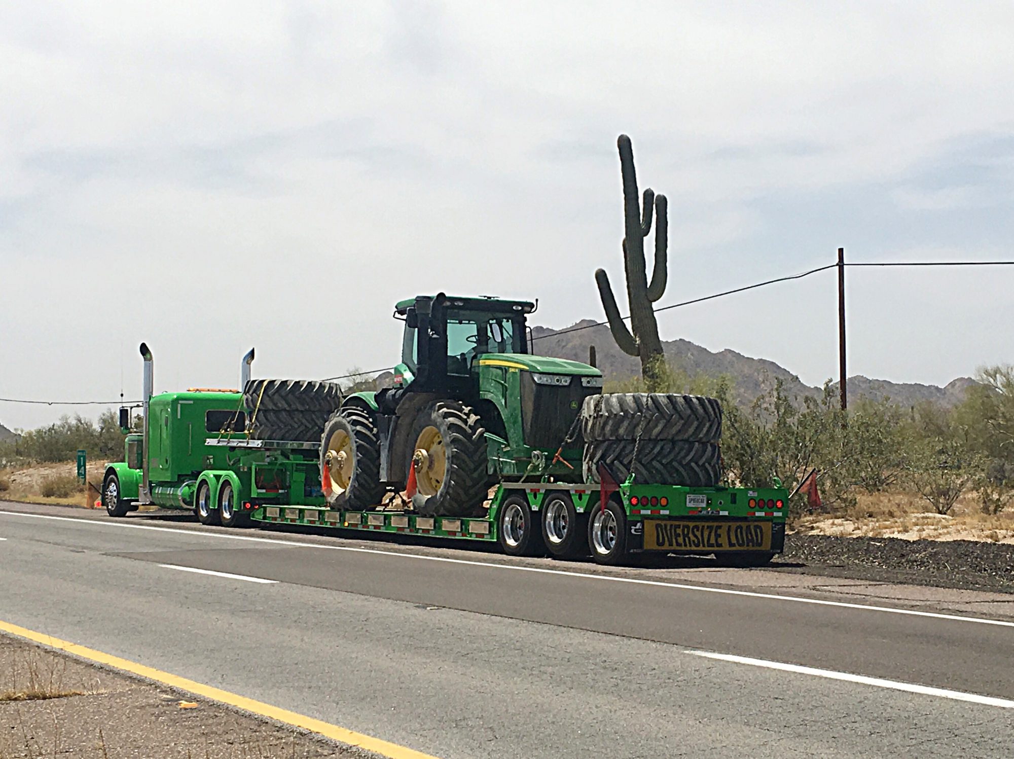 Green-Triple-Axle-Lowboy-Trailer-loaded - Jet Co Trailers
